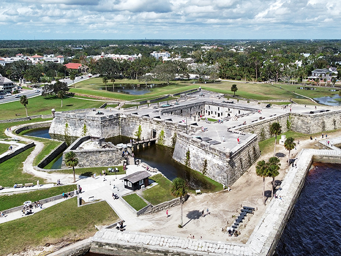 The mighty Castillo de San Marcos has stood guard since the 1600s, its coquina walls absorbing both cannonballs and tourist photos equally well.