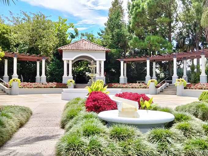 The central pavilion stands like a classical temple dedicated to botanical beauty, inviting visitors to pause beneath its protective embrace.