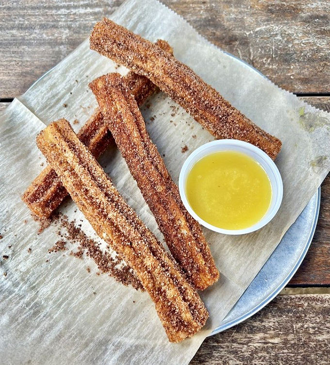 These churros aren't just dessert, they're cinnamon-sugar magic wands that transform ordinary meals into memorable feasts.