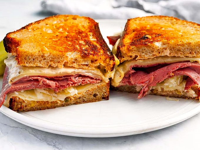 Behold the sandwich that launches road trips! This classic Reuben achieves that perfect ratio of meat to cheese to bread that keeps locals coming back weekly.