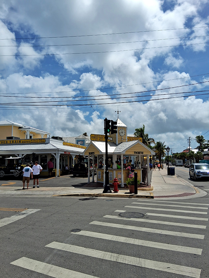 Sunshine, blue skies, and the yellow ticket booth – the perfect starting point for your Key West adventure.