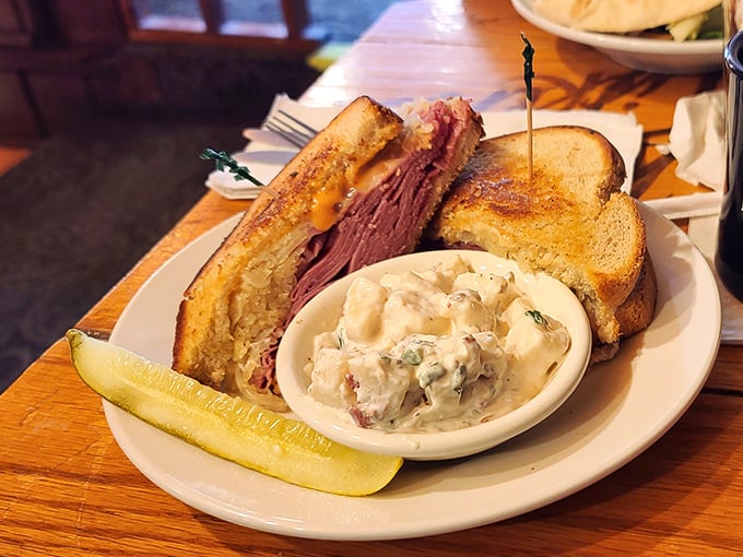 Stacked high with tender corned beef and melty goodness, this Reuben is comfort food done right.