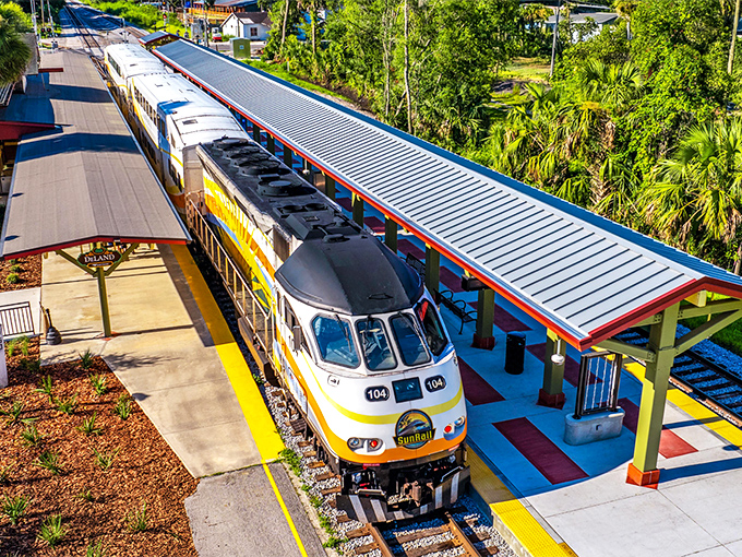 From above, DeLand Station's colorful architecture stands out against the lush Florida landscape, welcoming travelers to one of SunRail's newest stops.