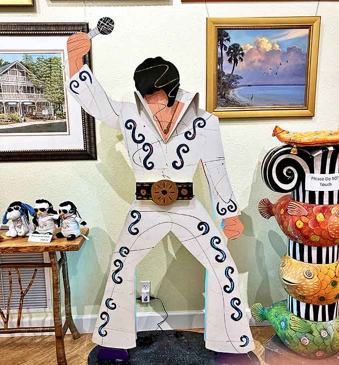 The King lives on in cardboard form! This Elvis figure stands eternally ready to serenade visitors with "Suspicious Minds"—which traditional art critics might have when first encountering this place.