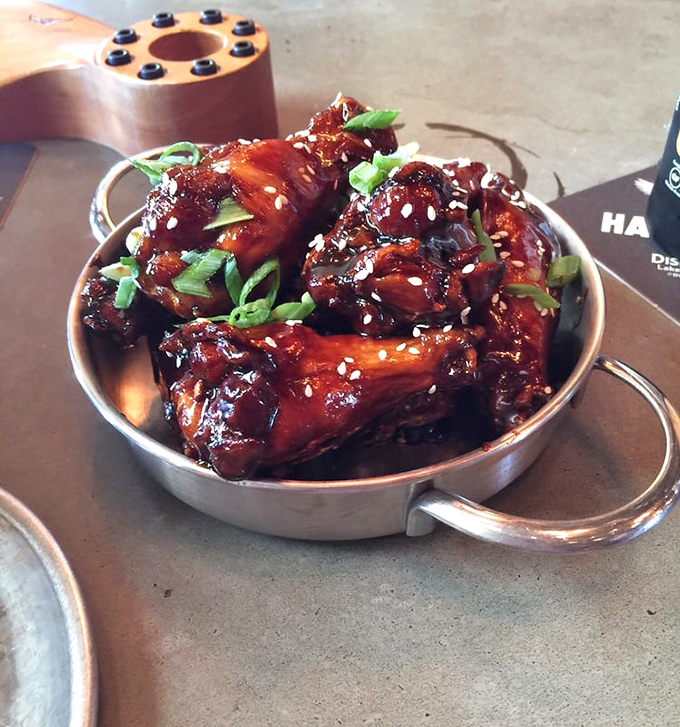 Sticky wings that would make even the most seasoned explorer lick their fingers clean&mdash;sweet, spicy, and worth the journey.