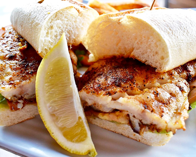 The Mahi sandwich &ndash; so fresh it practically swam onto your plate &ndash; paired with a squeeze of lemon for that perfect citrus kick.