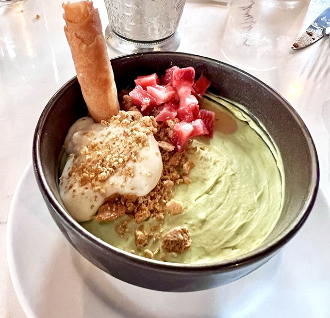 Sweet meets savory: The matcha mousse with cream, crunchy granola and fresh strawberries creates a playground of textures in every spoonful.