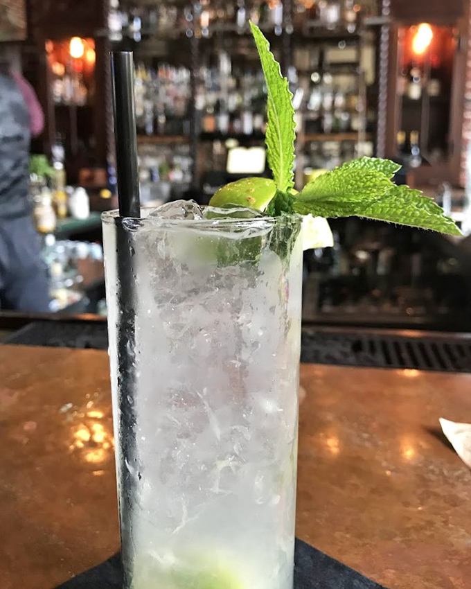Fresh mint stands tall like a proud flag in this perfectly crafted Mojito &ndash; crisp, refreshing, and impossibly photogenic.