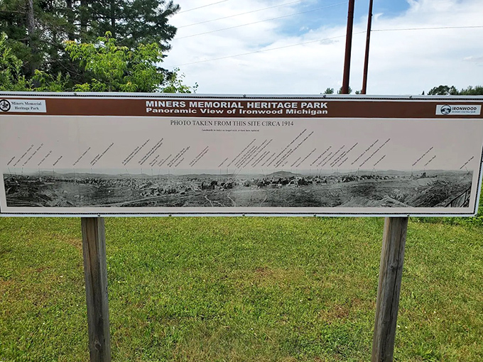 Educational signage explains the difference between the historical Hiawatha (an Iroquois leader) and Longfellow's poetic character that inspired this towering tribute.
