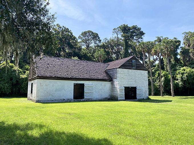 The plantation's outbuildings reveal construction techniques from another era, tabby walls still standing strong against time and elements.