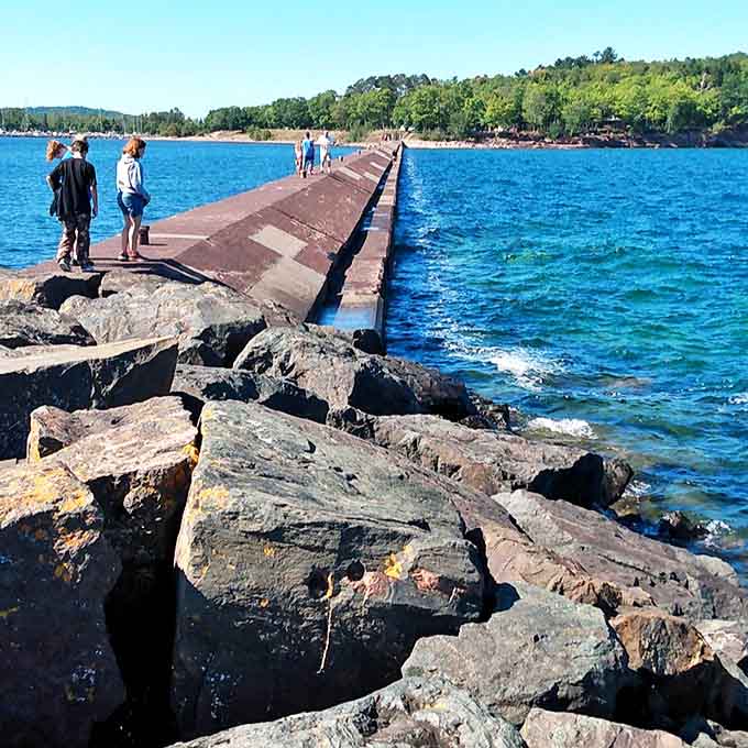 The Presque Isle breakwater invites brave souls to walk the plank &ndash; Lake Superior on both sides and nothing but courage keeping you dry.