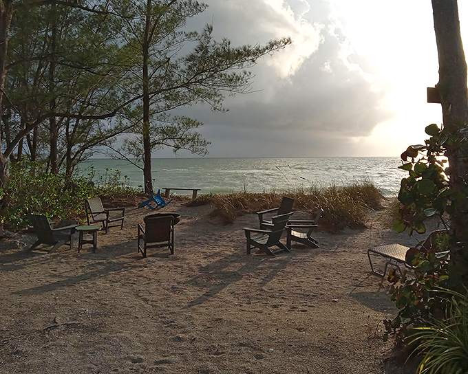 Adirondack chairs await sunset viewers on a secluded stretch of beach &ndash; nature's theater where the only admission price is appreciation.