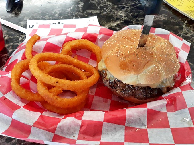 Crispy golden onion rings that shatter with each bite &ndash; the perfect sidekick to burger perfection.