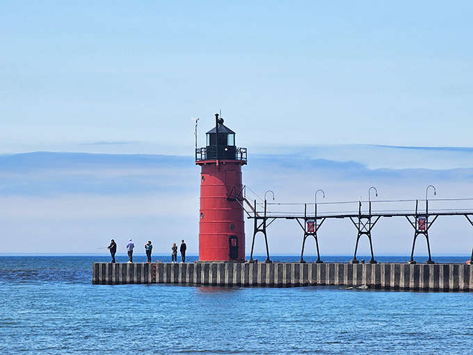 South Haven's iconic red lighthouse, standing guard like a faithful friend who never takes a day off.
