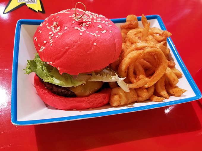 That ruby-red bun isn't just showing off &ndash; it's the ringmaster introducing the juicy, flavorful circus of toppings within.