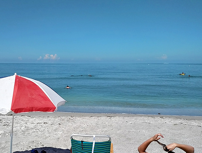 Beach chairs, umbrellas, and endless blue – the office setup we all deserve after surviving another year of adulting.