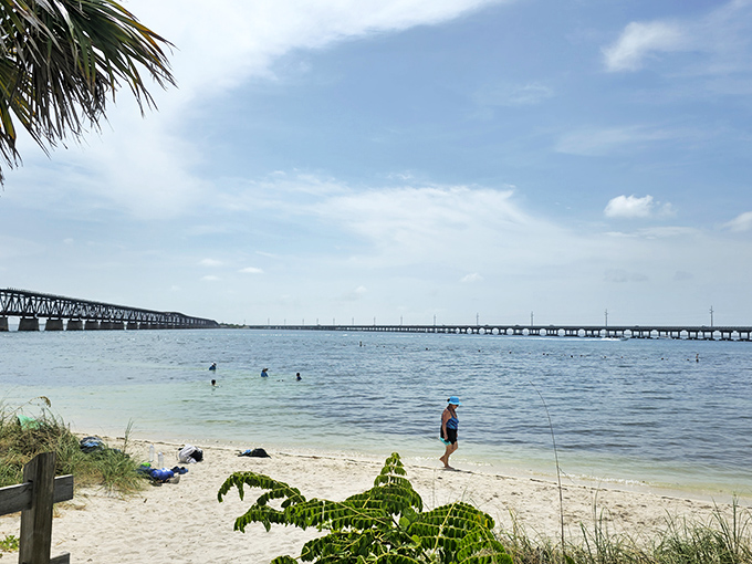 Beach therapy in session: A solitary figure enjoys the therapeutic effects of sand between toes and horizon gazing &ndash; nature's stress management program.