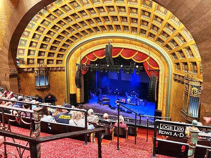 From the upper levels, patrons enjoy a breathtaking view of both the ornate ceiling and the stage below &ndash; a feast for the eyes before the show begins.