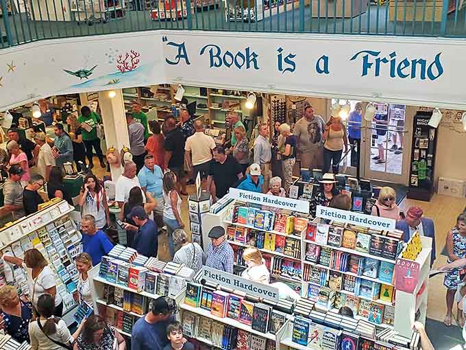 A bustling crowd during an author event proves independent bookstores aren't dying – they're thriving as community gathering spaces for literary minds.