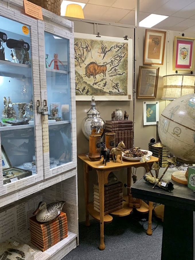 This booth feels like stepping into a sophisticated time capsule, complete with artwork and artifacts from another era.