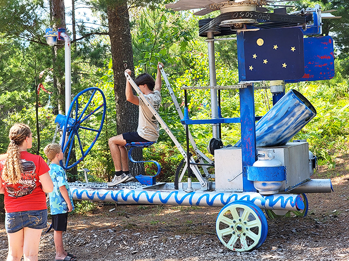 Young adventurers interact with the hands-on exhibits, proving that art appreciation starts early when it's this engaging and accessible.