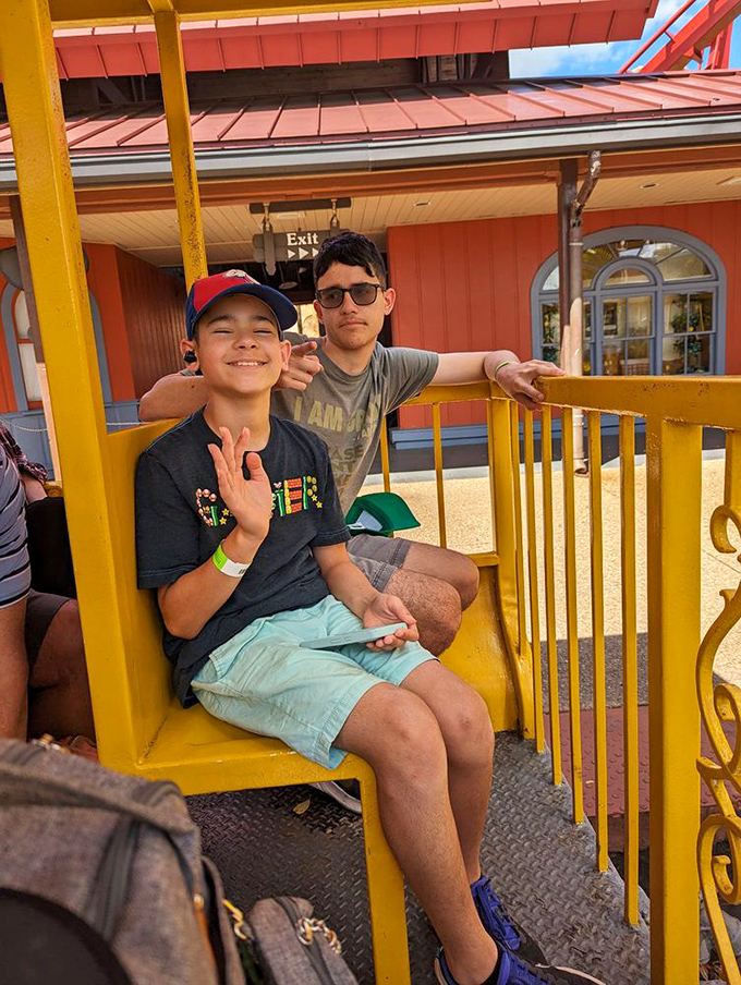 Visitors: Young adventurers enjoy the perfect perch for wildlife spotting, their excitement as genuine as the animals they're about to encounter.