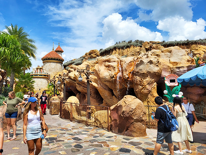 Visitors from around the world gather in anticipation, their faces showing that pre-mermaid excitement we all know so well.