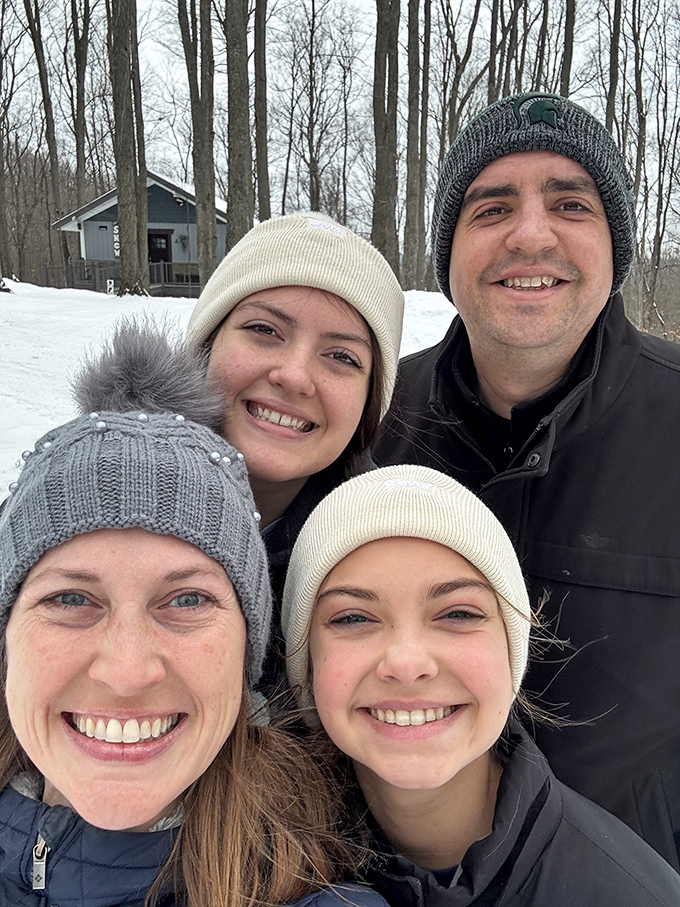 Happy visitors capturing memories at Tree House Ridge – their smiles say everything about the joy of rediscovering your inner child in the treetops.