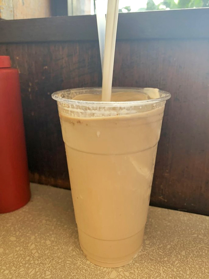 This walnut shake isn't just a beverage, it's a time machine. One sip and suddenly you're twelve years old again, wondering if you can finish the whole thing.