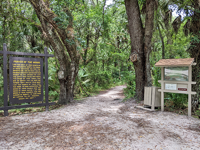 The "Prayer of the Woods" sign marks the entrance to trails where even confirmed atheists might find something spiritual.