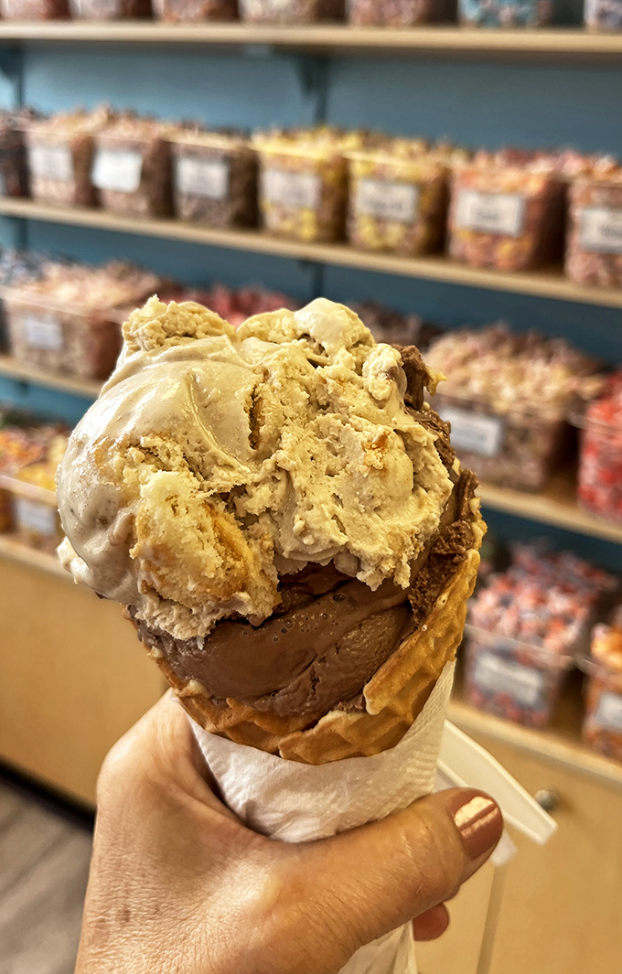 This isn't just ice cream, it's architectural brilliance in a waffle cone, defying gravity and dietary restraint simultaneously.