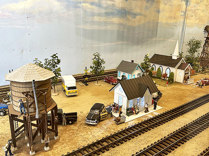 Model train diorama: Miniature worlds captivate young imaginations as tiny trains wind through perfectly scaled landscapes, creating Lilliputian magic for wide-eyed visitors.