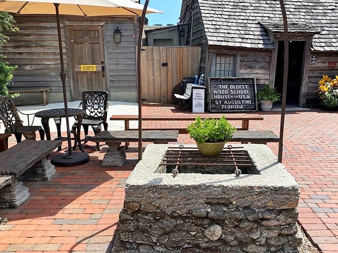 Courtyard Oasis: A peaceful brick patio with historic well offers respite from Florida heat, just as it did for colonial students centuries ago.