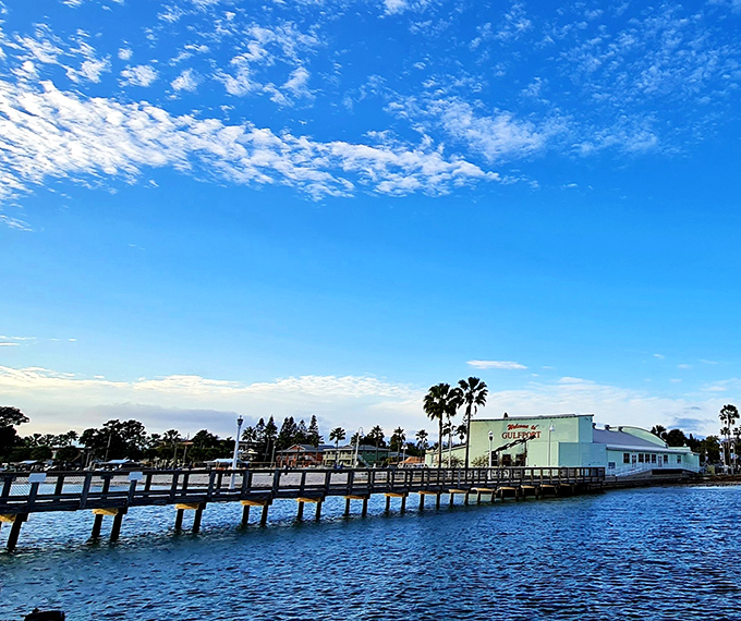 Gulfport's iconic pier stretches into Boca Ciega Bay, offering spectacular sunset views and a perfect spot for contemplating life's big questions – or just today's catch.