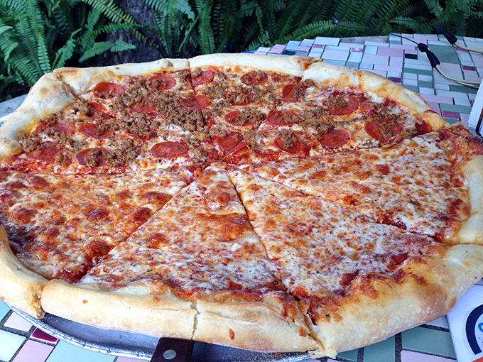 Half cheese, half pepperoni perfection on a canvas of handcrafted dough. Simple ingredients transformed into something transcendent by pizza artisans.