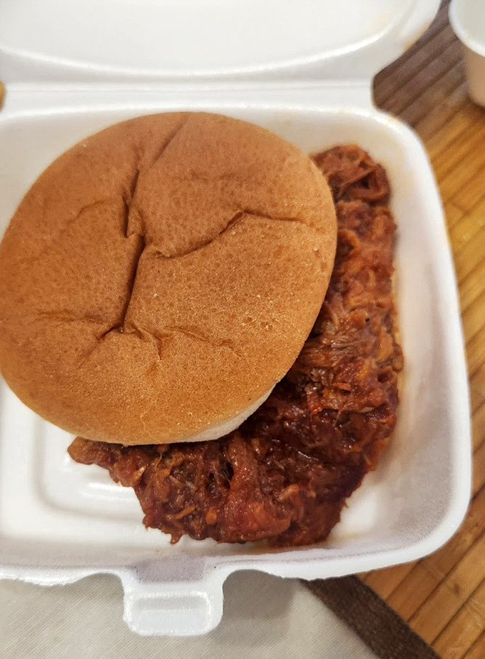 Pulled pork perfection &ndash; tender, juicy meat on a soft bun that somehow manages to hold everything together without engineering assistance.