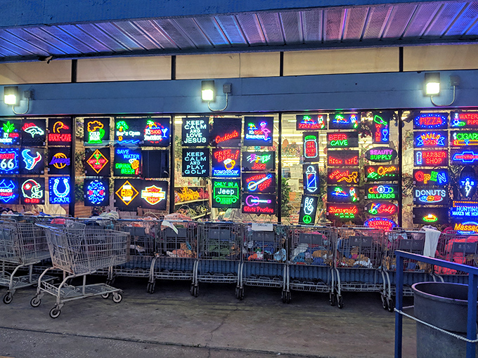 The window display glows with neon signs advertising everything from beer to donuts&mdash;Times Square energy on a Clearwater budget.
