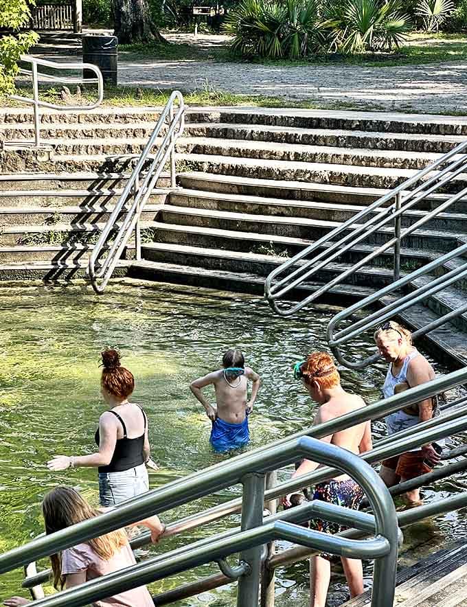 Brave souls take the plunge into the spring's crystal waters, discovering that nature provides the most refreshing swimming experience imaginable.