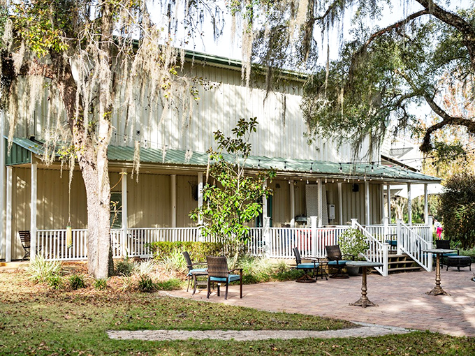 Southern charm meets vacation bliss at the main house, where wraparound porches and rocking chairs beckon for afternoon lemonade sessions.