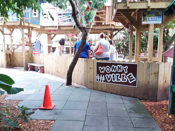 Wonky-Ville invites adventurous spirits to explore its playful wooden structures, where reality bends just enough to transport visitors into a storybook world.