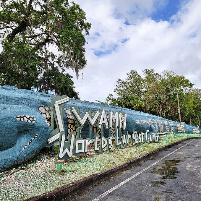 The side view of the World's Largest Alligator reveals just how enormous this concrete creature truly is, stretching 200 feet along the roadside.