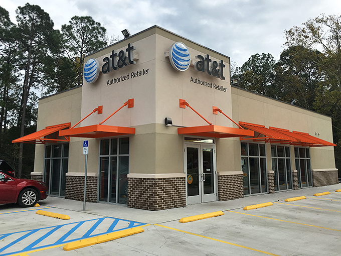 Even modern conveniences blend into the town's aesthetic, with businesses like this AT&T store maintaining the community's architectural harmony.
