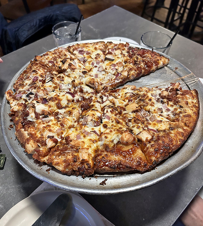 BBQ Chicken pizza that makes you question your loyalty to traditional toppings&mdash;sweet, smoky, and absolutely irresistible.