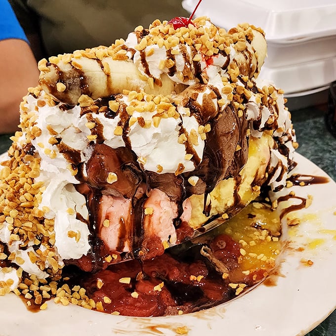 Whipped cream applied with joyful abandon creates snowy peaks, while chopped nuts add textural contrast to this frozen landscape of deliciousness.