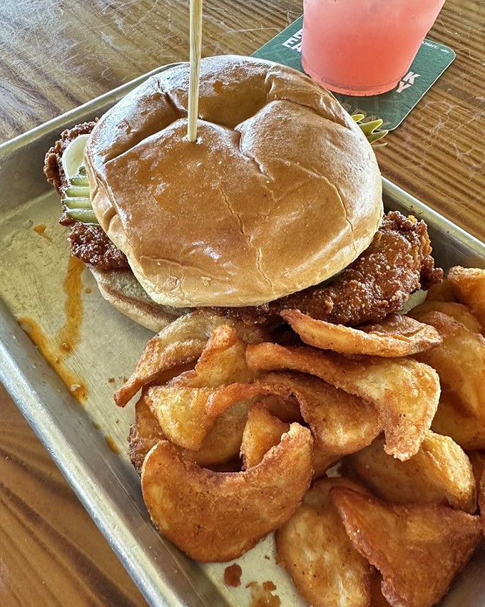 The burger arrives like a dare &ndash; golden-brown bun, perfectly cooked patty, and house-made chips that make you question your loyalty to French fries.