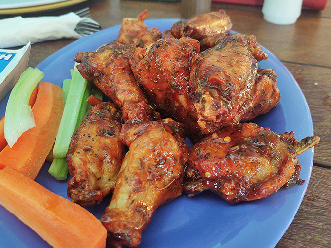 These wings aren't just wings &ndash; they're crispy, saucy revelations that prove seafood isn't the only thing they do right here.