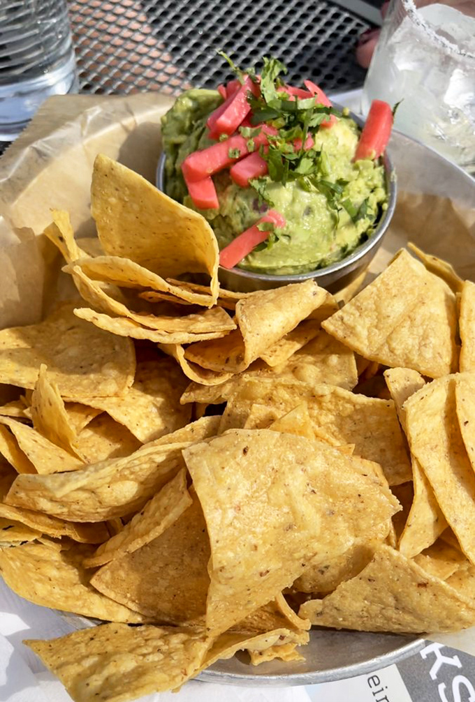 Guacamole and chips &ndash; the dynamic duo of Mexican cuisine &ndash; fresh, vibrant, and practically begging for a margarita companion.