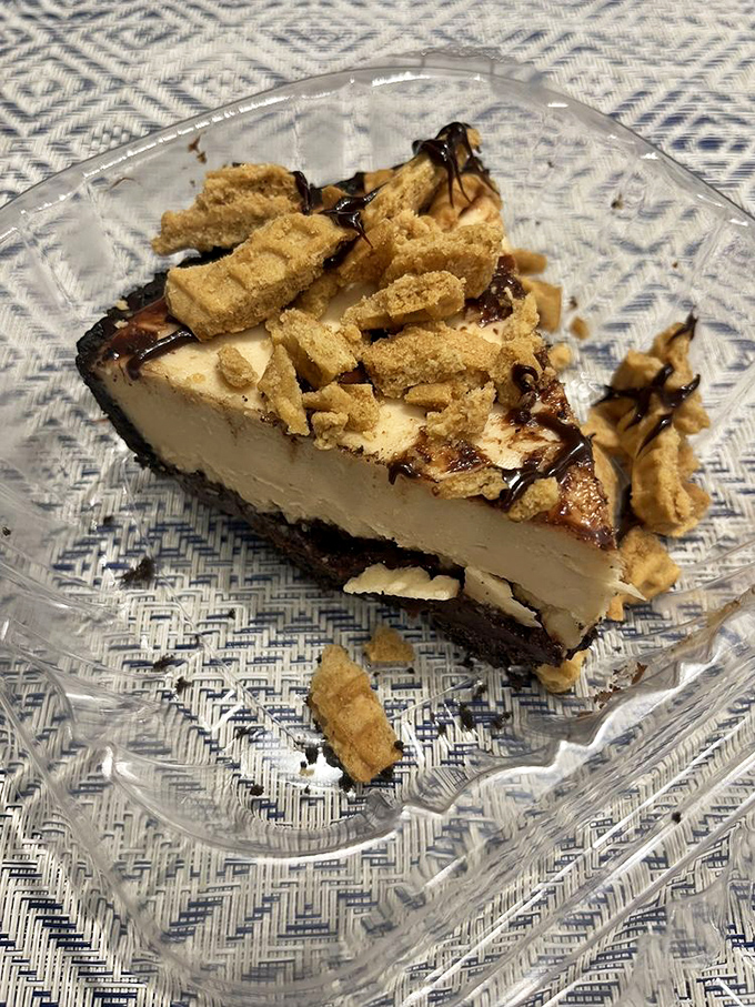 The classic flavor combination elevated to art form &ndash; creamy peanut butter filling topped with chocolate ganache on a chocolate crust.