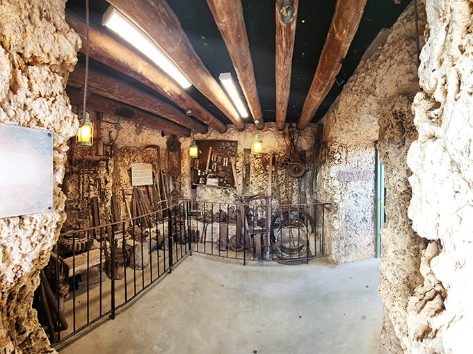 The cheerful blue sign welcoming visitors to Coral Castle Museum belies the mind-bending mysteries waiting just beyond those coral walls.