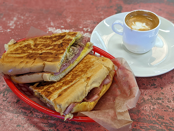 The quintessential Miami sandwich executed with textbook precision &ndash; crispy exterior, melty interior, and that perfect balance of ham, pork, cheese, pickles, and mustard.